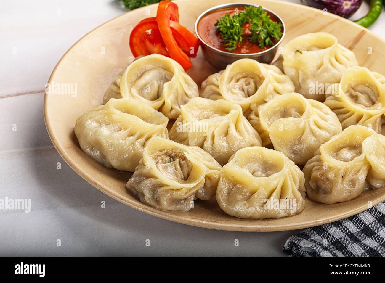 Steamed Nepali dumpling Momo with sauce stuffed chicken, meat, seafood ...