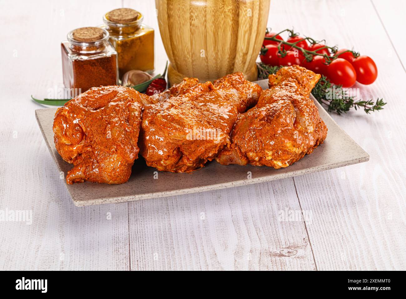 Raw turkey shoulder wing in Indian tandoori marinade spices Stock Photo ...