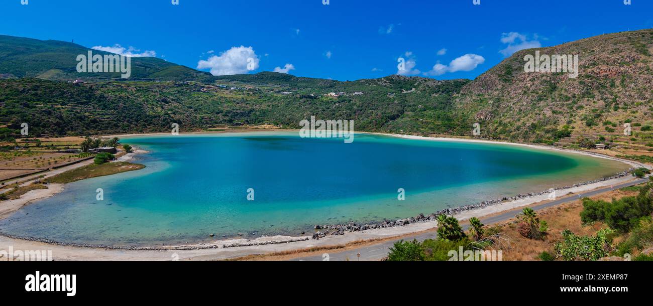 Panoramic view of the turquoise-green waters of Venere's Mirror a ...