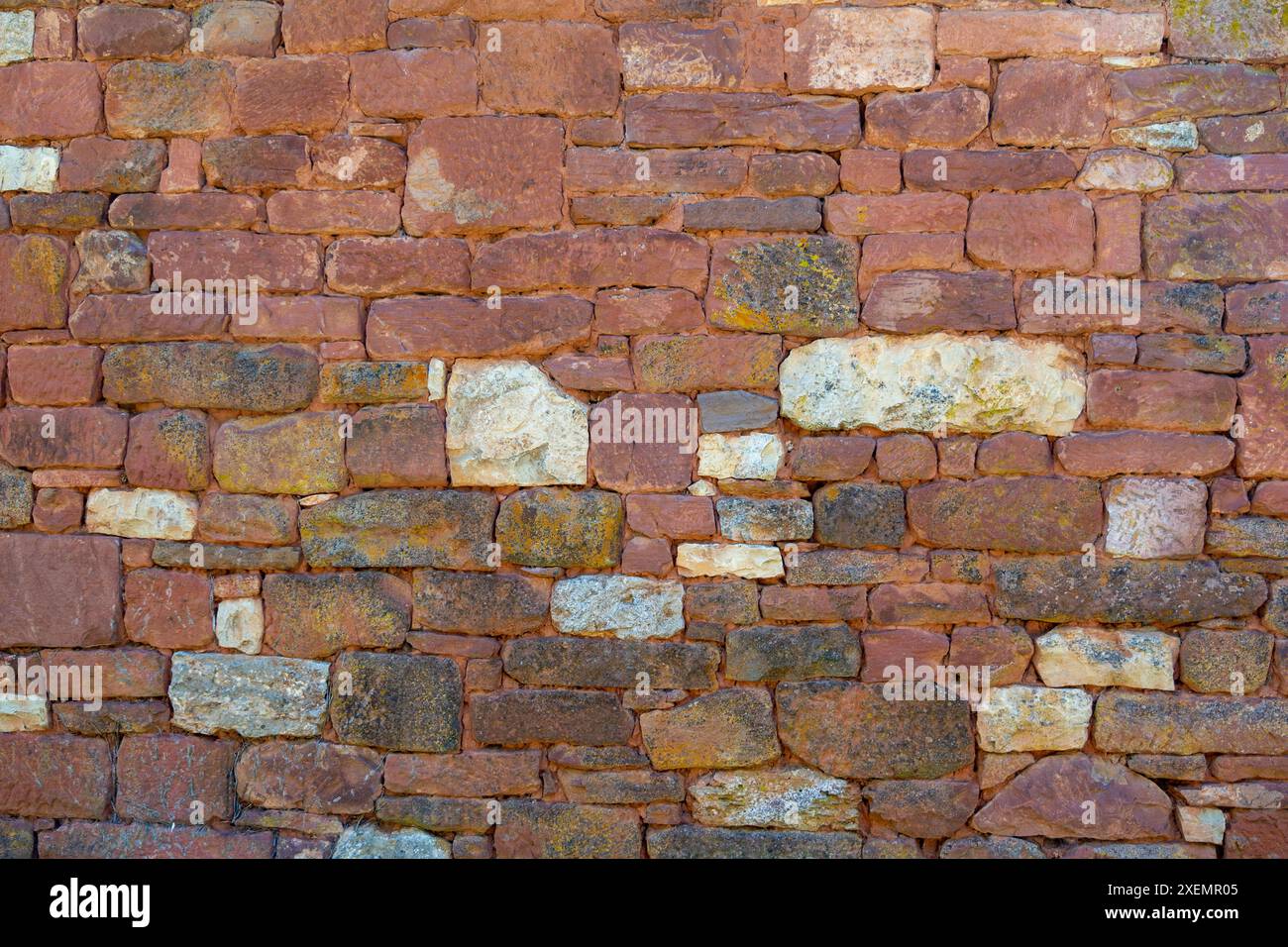 Red brick background in Collonges-la-Rouge village one of the most ...