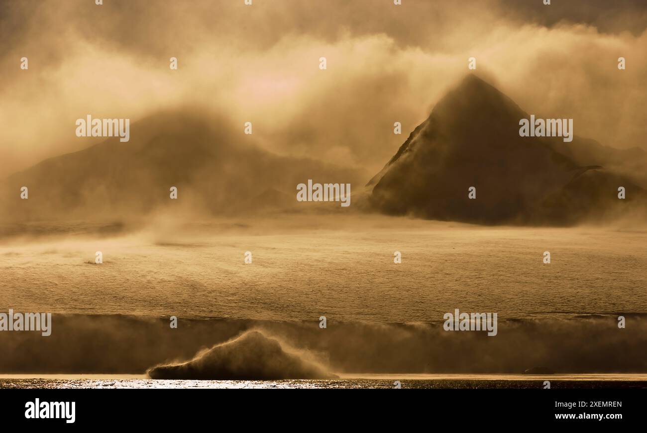 Katabatic wind in Antarctic Sound, with warm light illuminating the ...