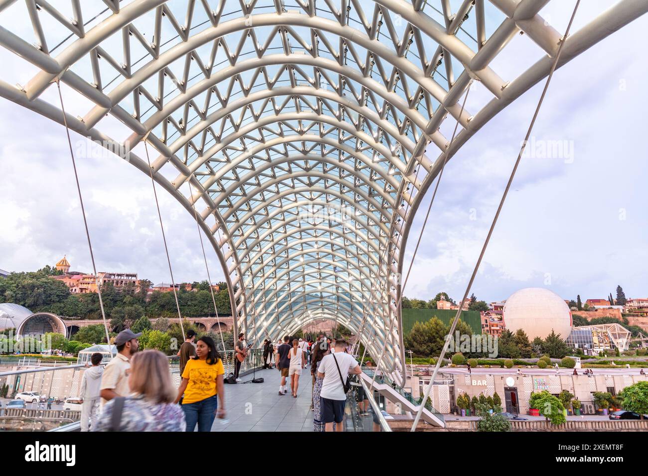 Tbilisi, Georgia - June 16, 2024: The Bridge of Peace is a bow shaped ...