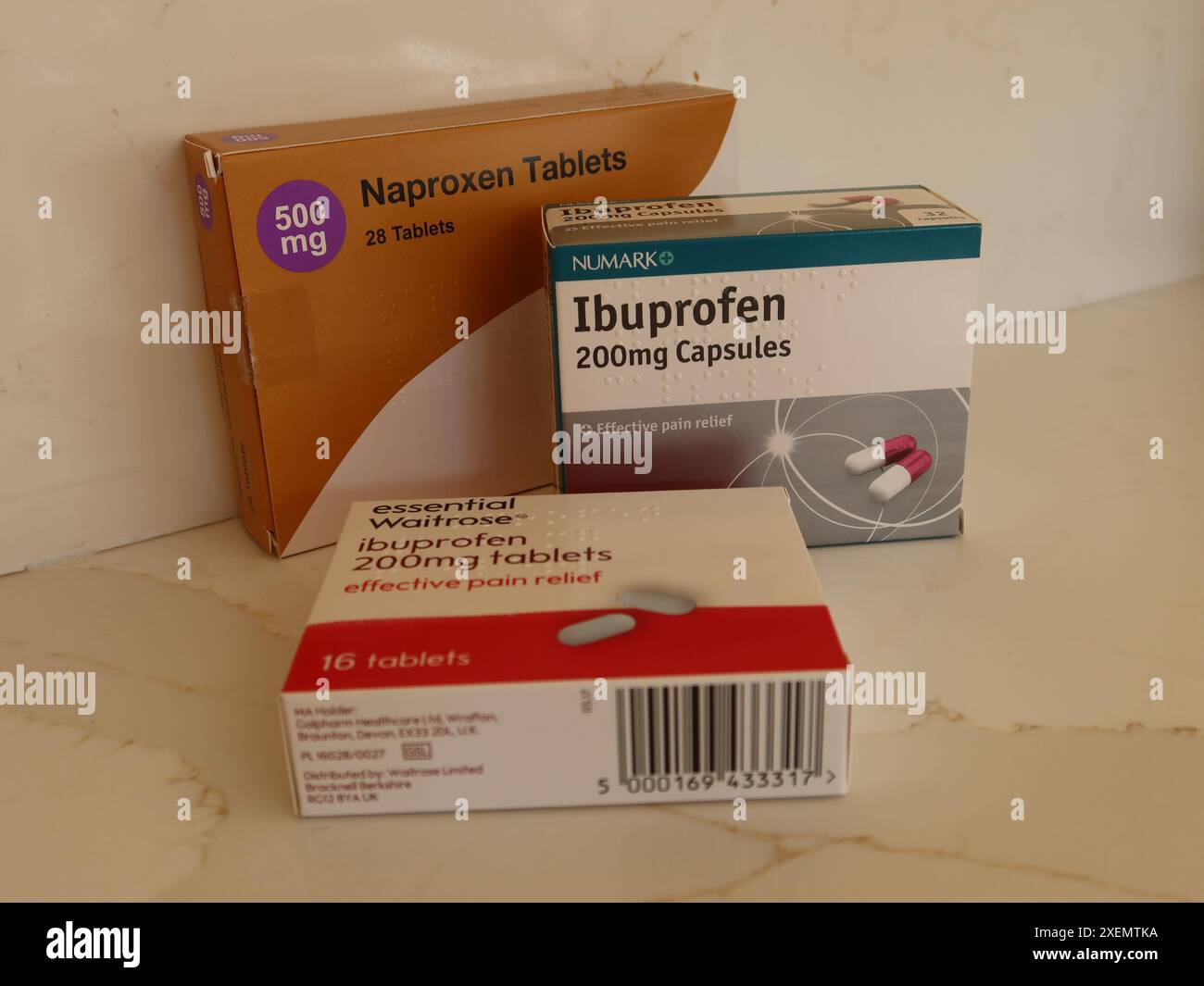 Naproxen tablets & Ibuprofen pills & capsules; examples of varying ...