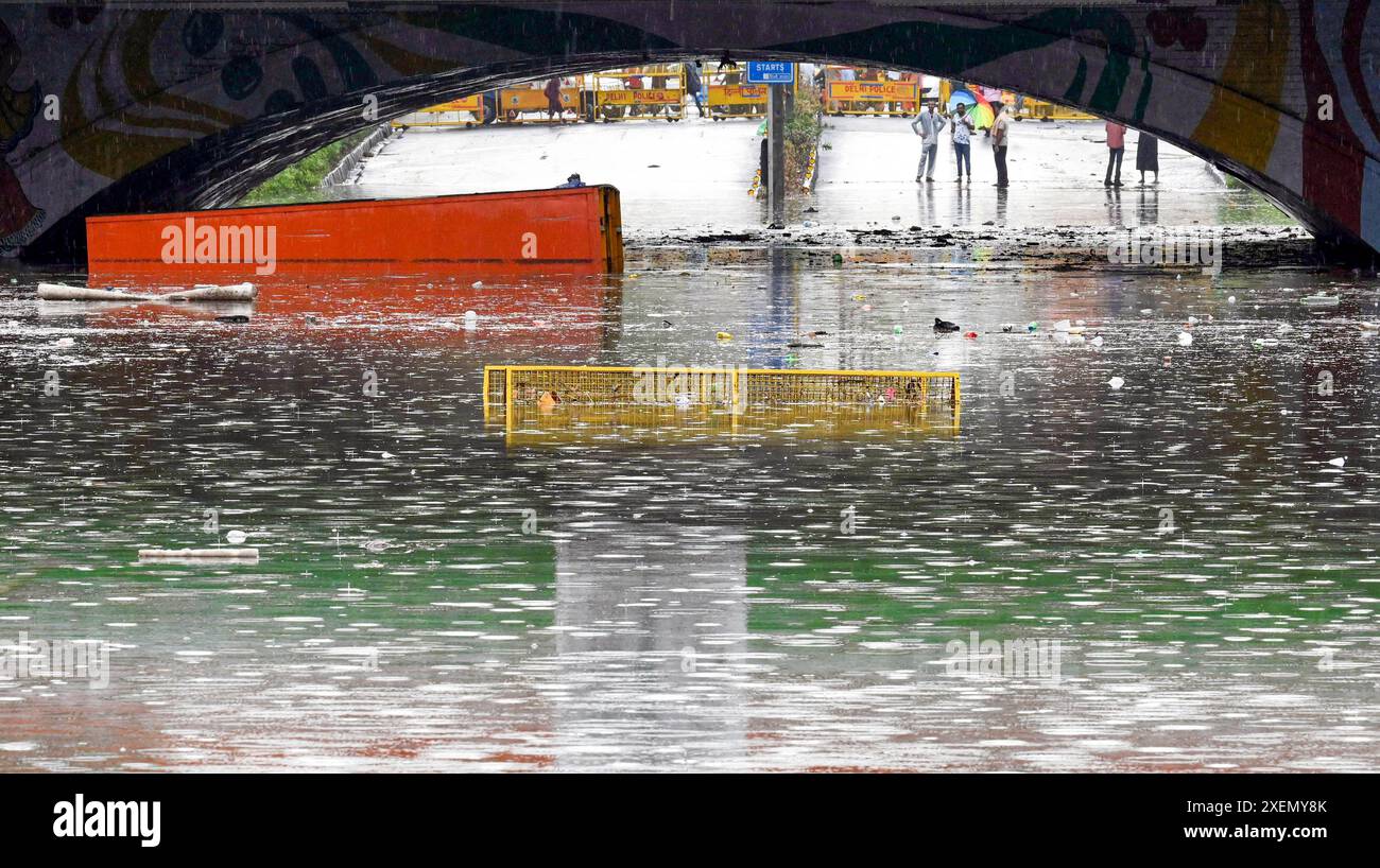 NEW DELHI, INDIA - JUNE 28: A Truck is stuck in logged water under Minto Bridge near Connaught ...