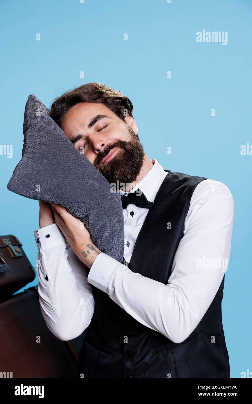 Tired hotel staff hi-res stock photography and images - Alamy