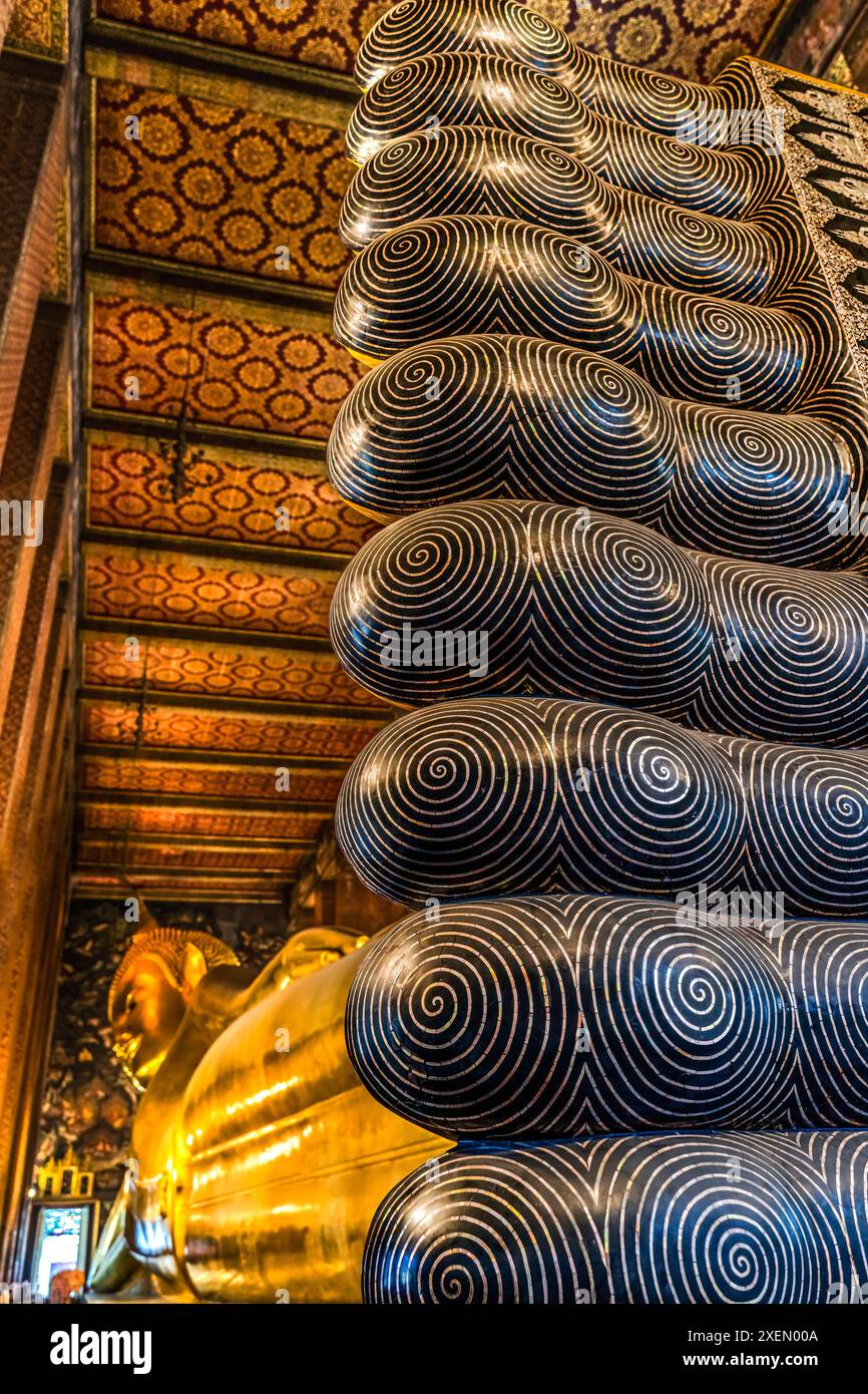 Colorful Reclining Buddha toes, Bangkok, Thailand. Temple built in 1600 ...