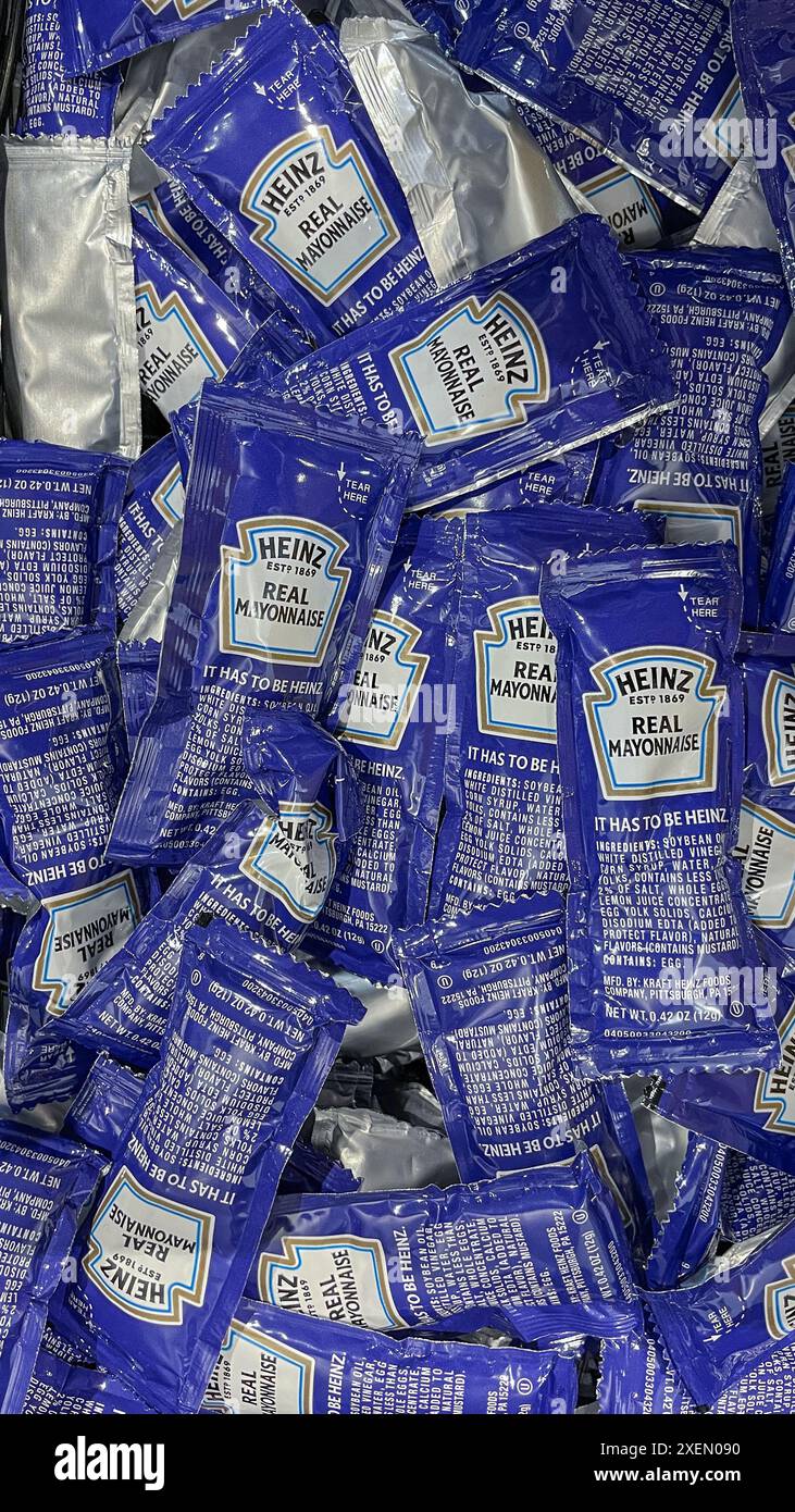 Indianapolis - June 28, 2024: Heinz Mayonnaise packets. KraftHeinz is a ...