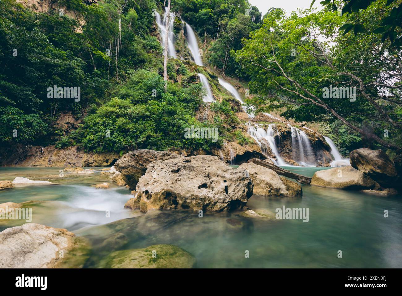 Beautiful cascading series of waterfalls (Lapopu Waterfall) flowing ...