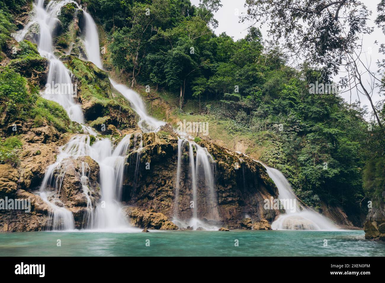 Beautiful cascading series of waterfalls (Lapopu Waterfall) flowing ...