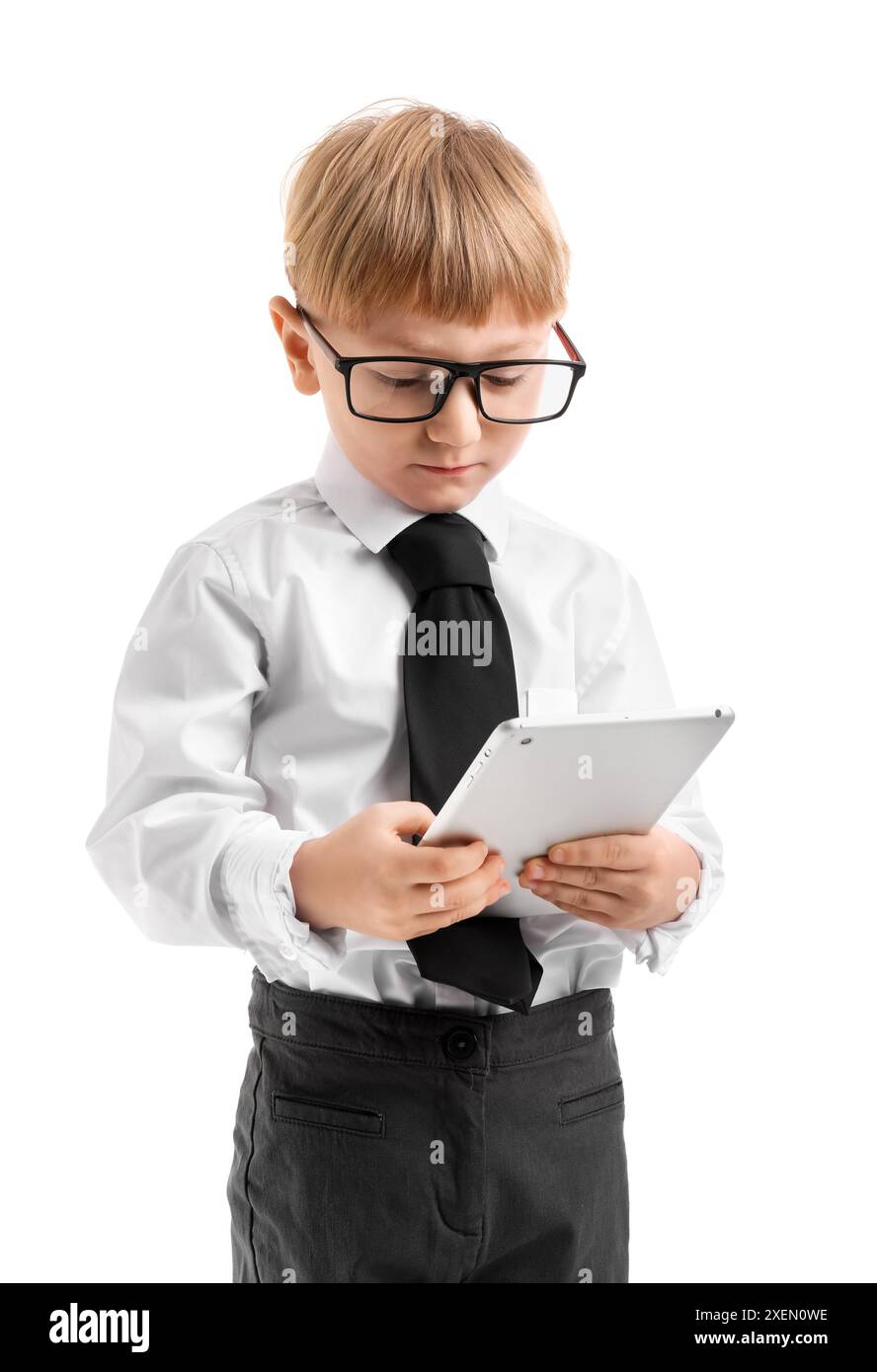 Funny little businessman using tablet computer on white background ...