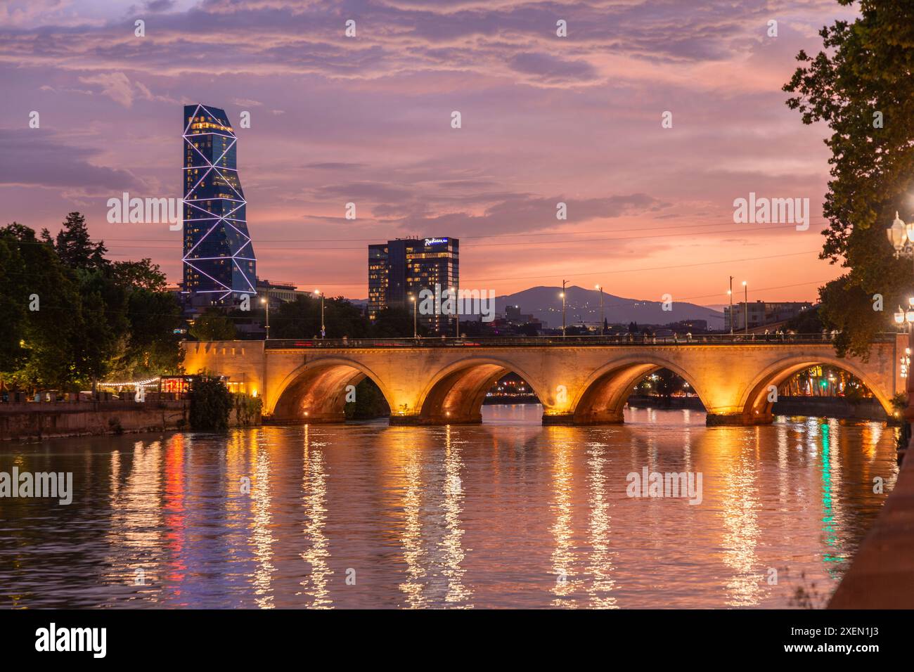 Tbilisi, Georgia - 16 JUNE, 2024: Saarbrucken Bridge on Kura River in ...