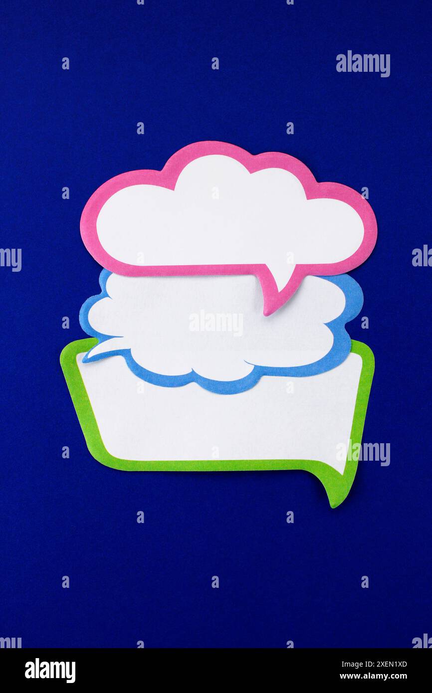 Three comment bubbles with different shape and color Stock Photo - Alamy