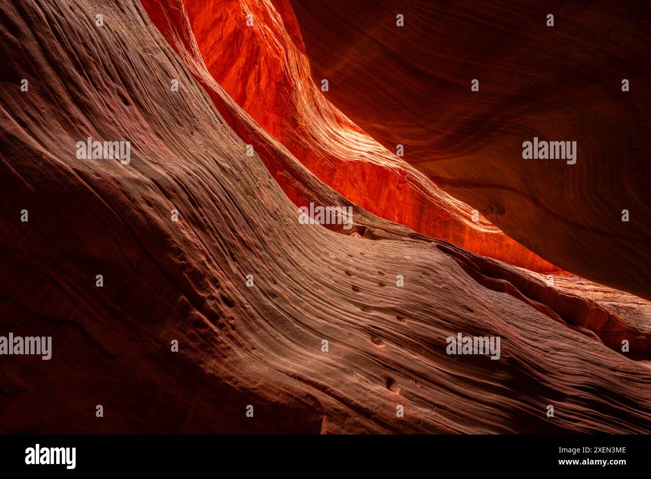 Sunlight illuminates the red striations of Mystic Canyon, an amazing ...