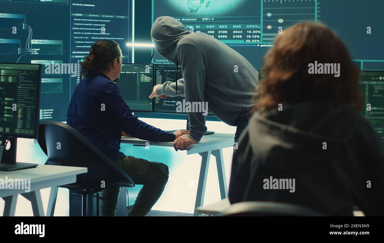 Governmental agency team conducting cyber hi-res stock photography and ...