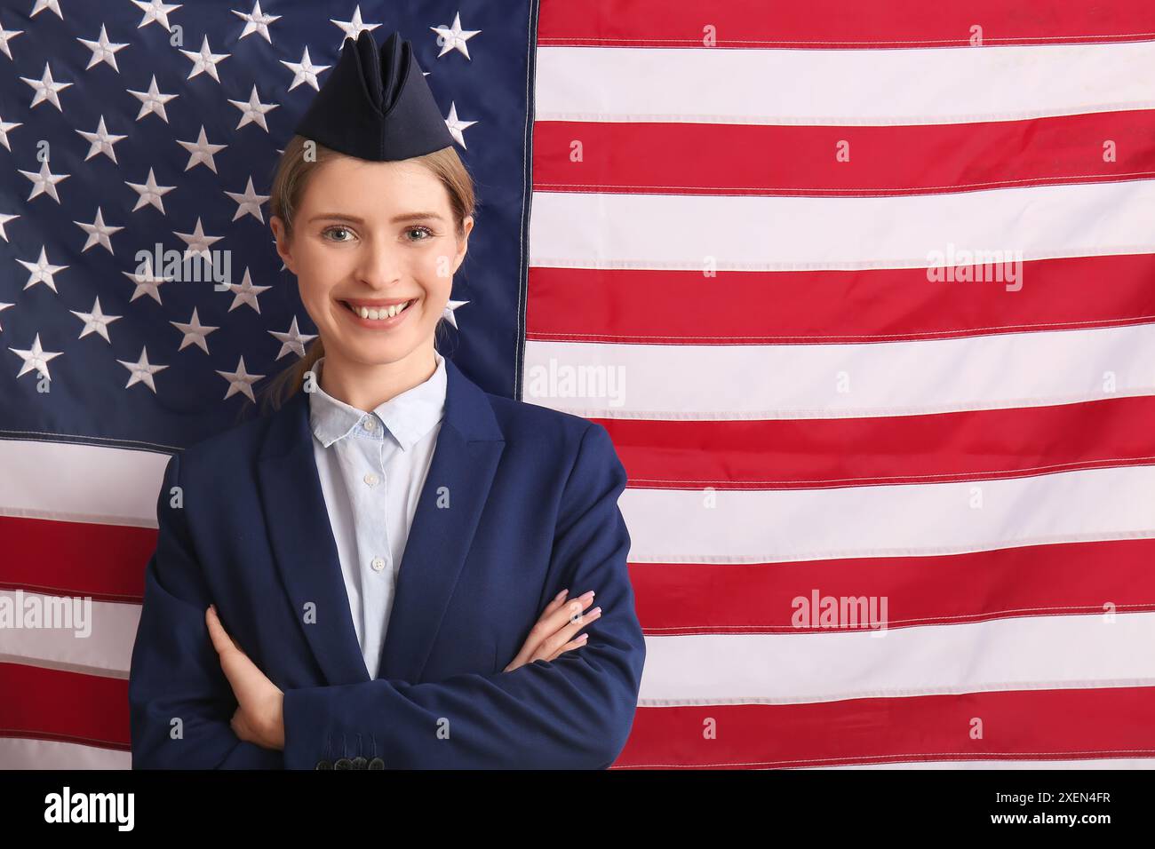 Female stewardess on USA flag background Stock Photo - Alamy