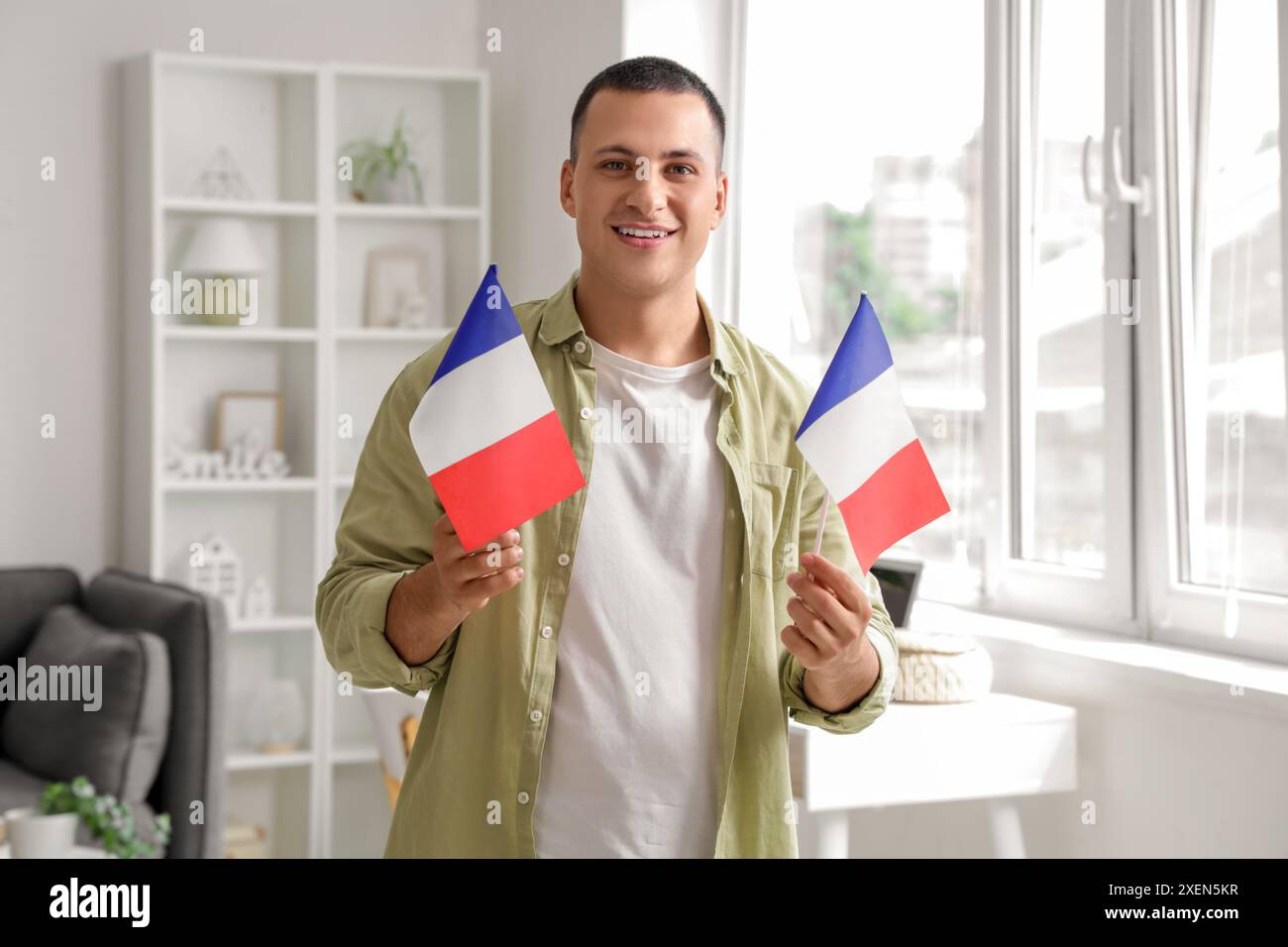 Handsome man flags france hi-res stock photography and images - Alamy