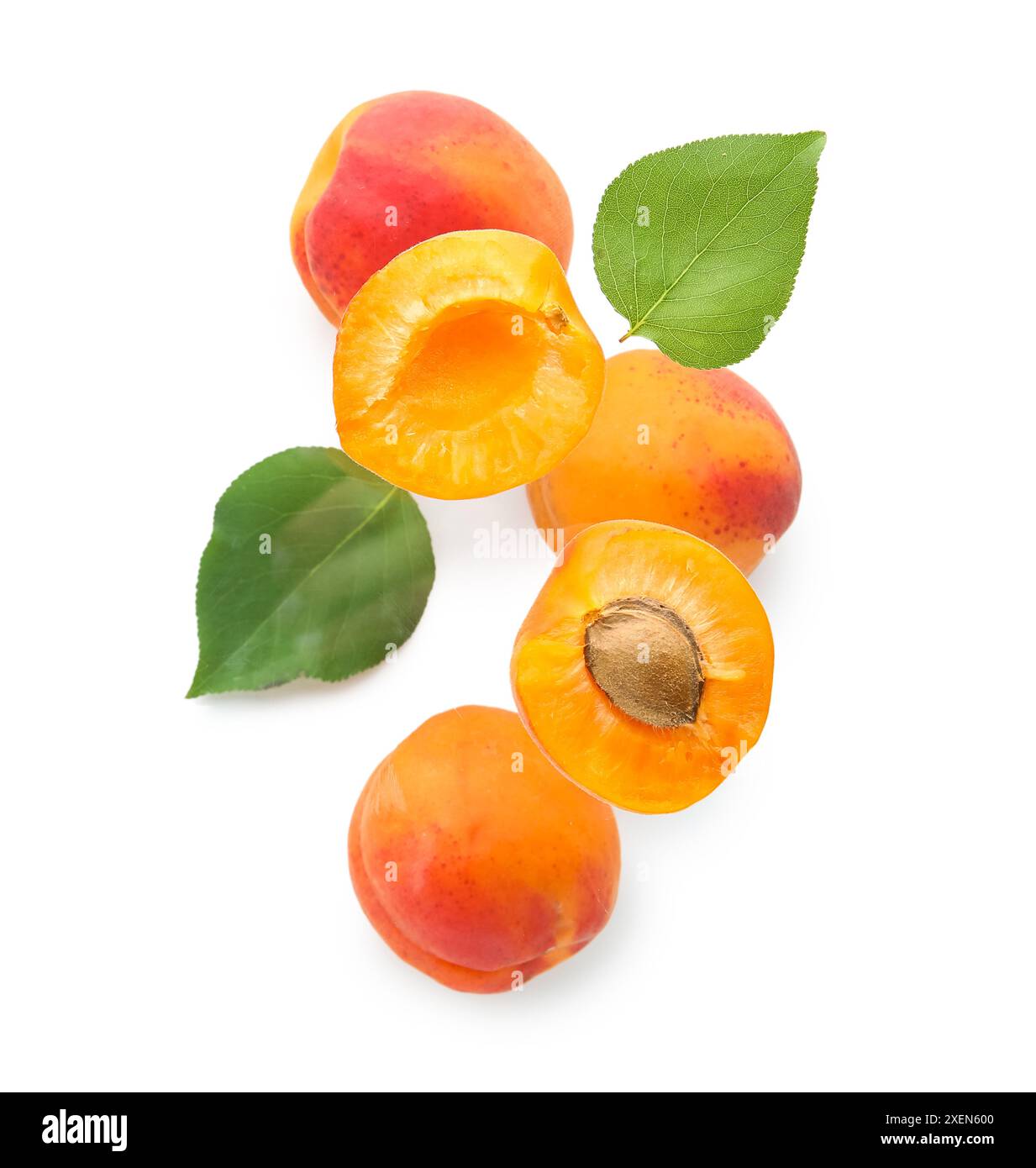 Flying apricots with leaves isolated on white background Stock Photo ...