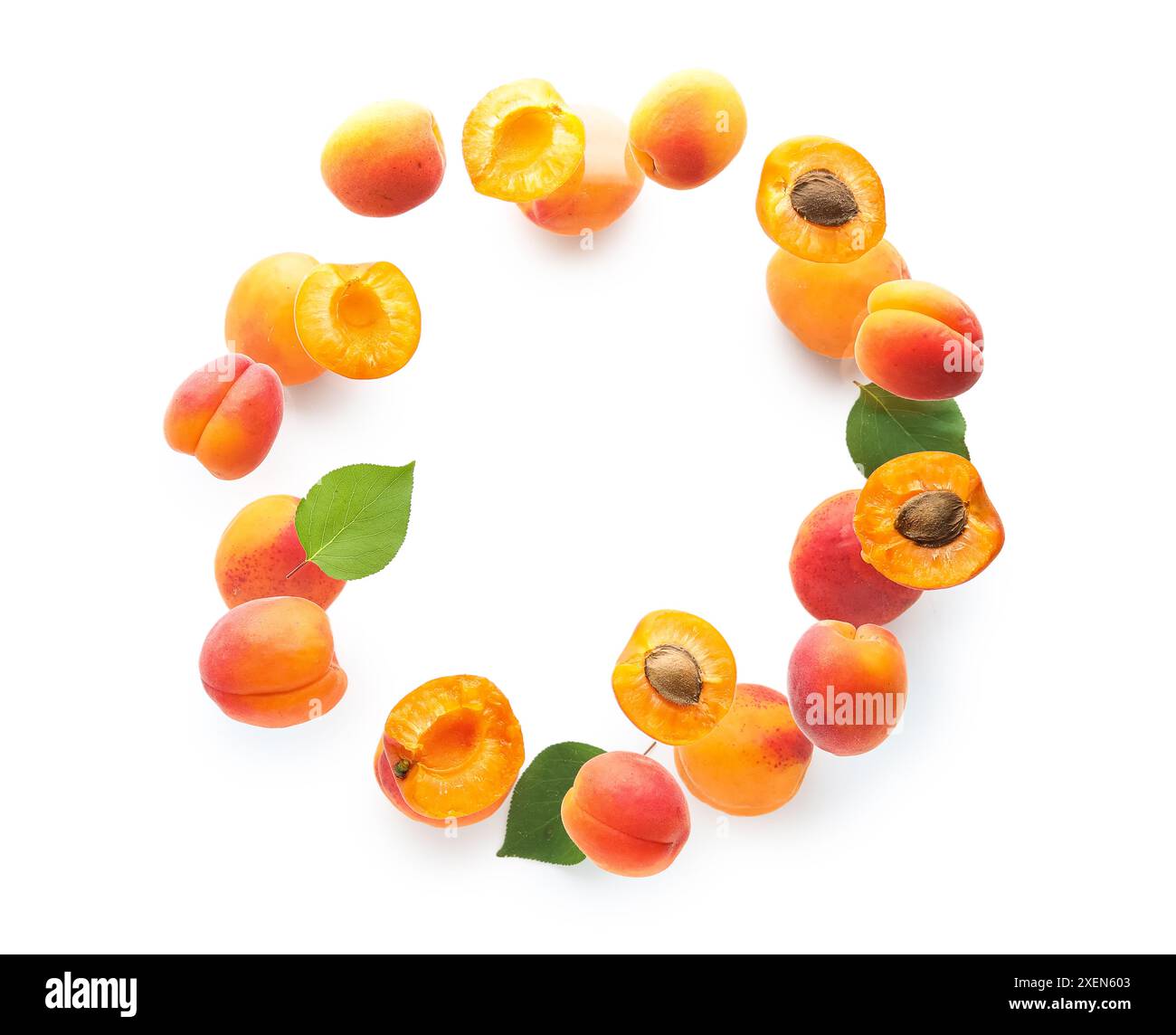 Frame made of flying apricots with leaves isolated on white background ...