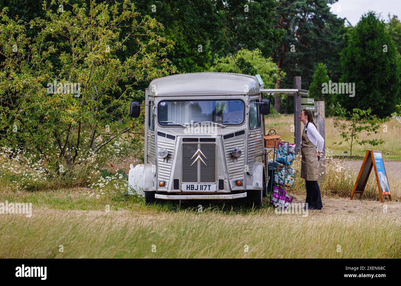 A vintage silver classic Citroen van converted for selling snacks and ...