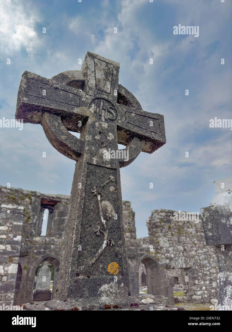 Celtic cross at Burrishoole Abbey is dotted with lichen Stock Photo - Alamy
