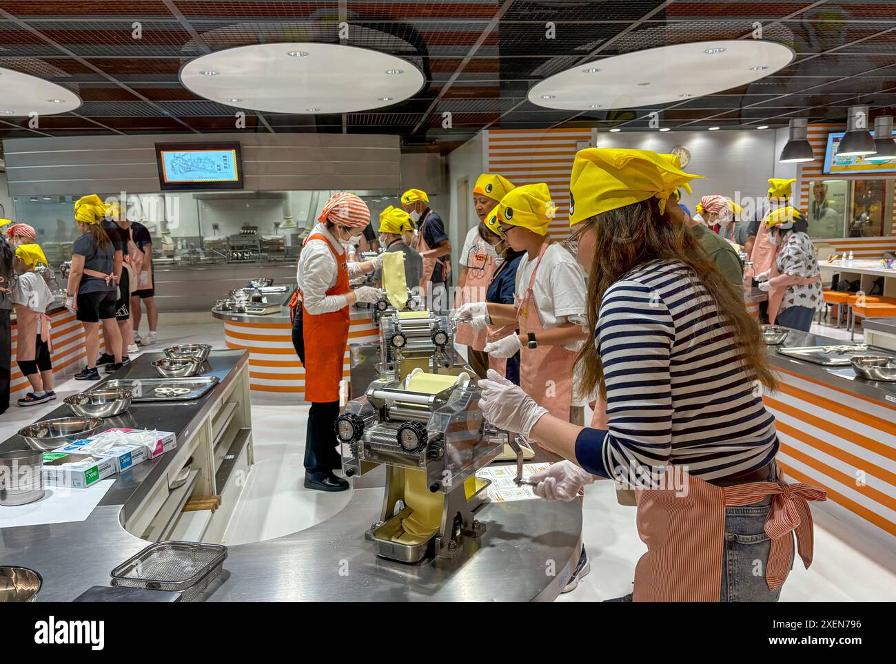 Visitors seen learning about the production process of instant noodles ...