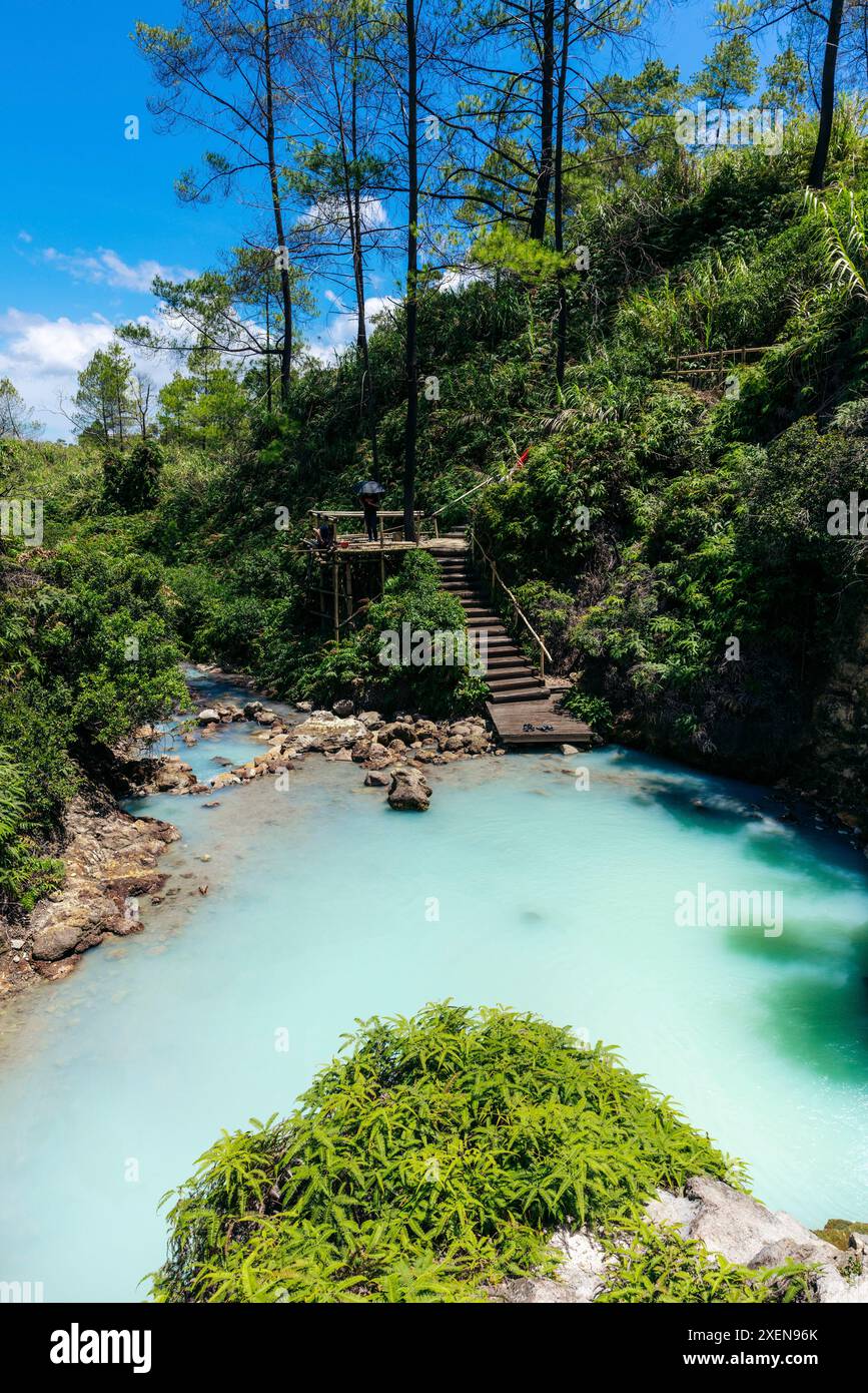 Tourist stands enjoying the lookout platform at Mahwatu wisata Tomohon ...