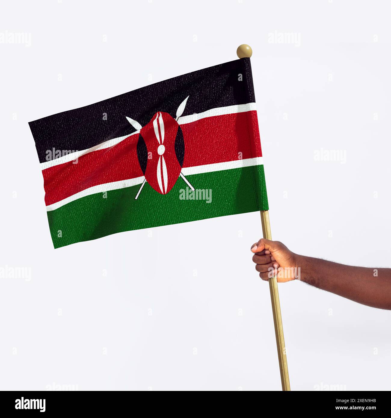 Black african Hand holding Kenyan national flag isolated over white ...