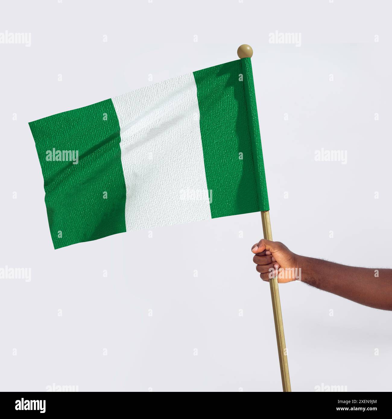 Outstretched Black african Hand holding Nigerian national flag isolated ...