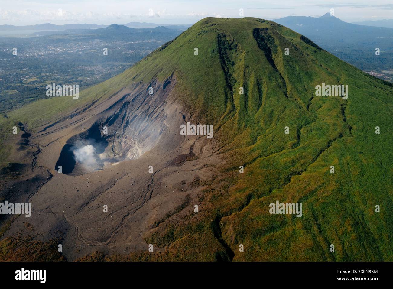 Mount Lokon with geothermal activity in North Sulawesi, Indonesia ...