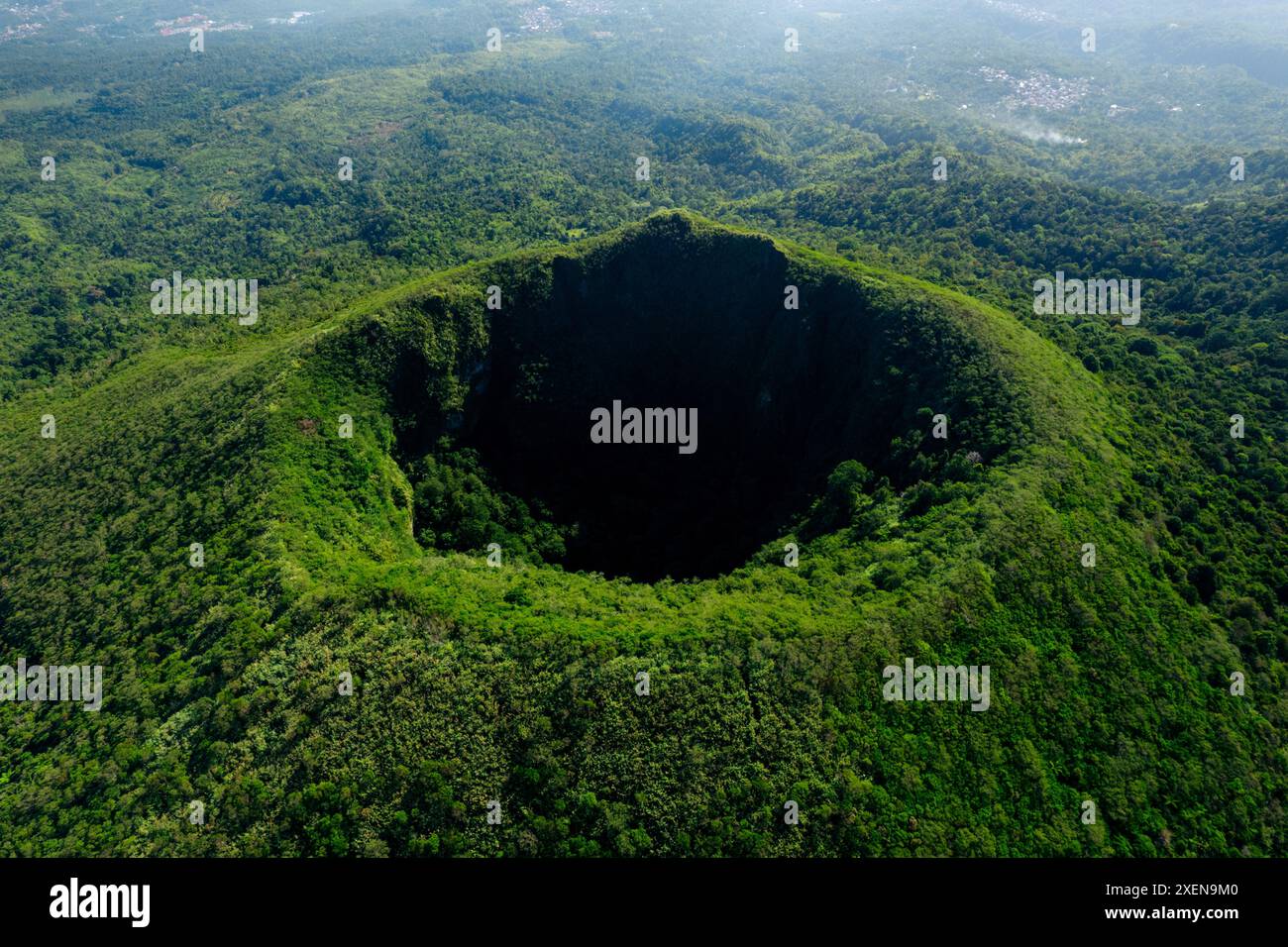 Mount Empung with crater and covered in lush vegetation in North ...