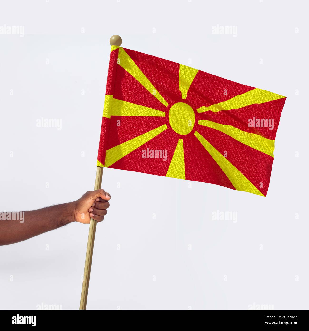 Outstretched Black african Hand holding North Macedonia national flag ...
