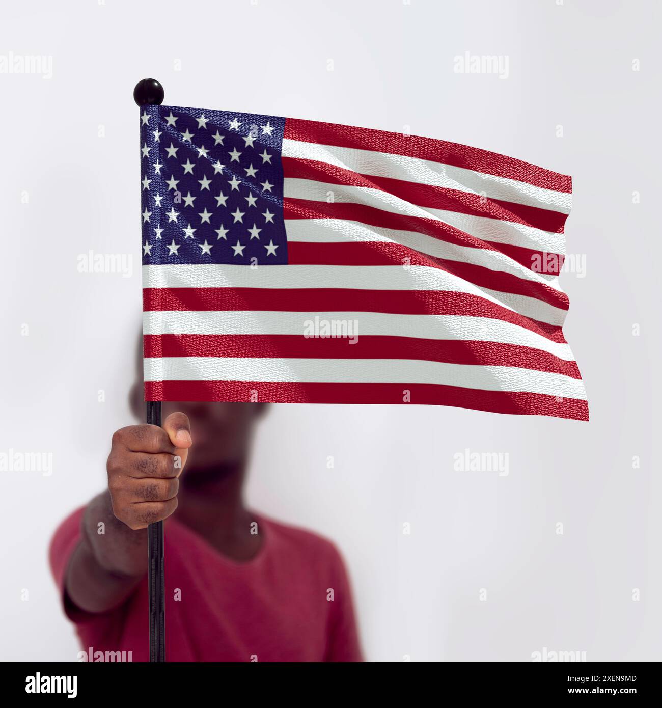 Black african male holding USA national flag against white background ...