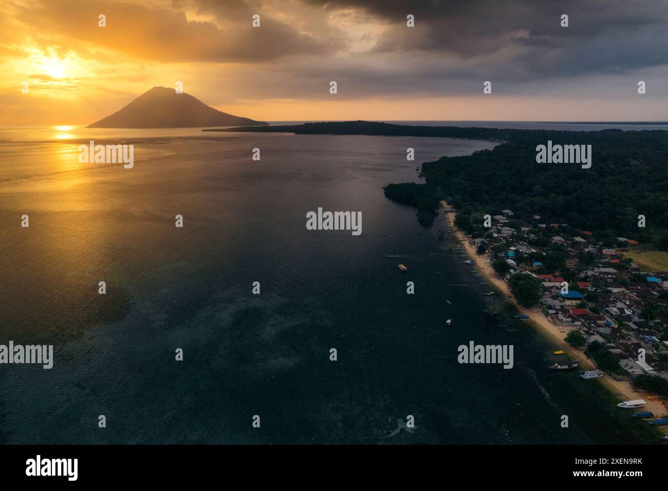 Drone view Bunaken island at sunset, North Sulawesi, Indonesia; Bunaken ...