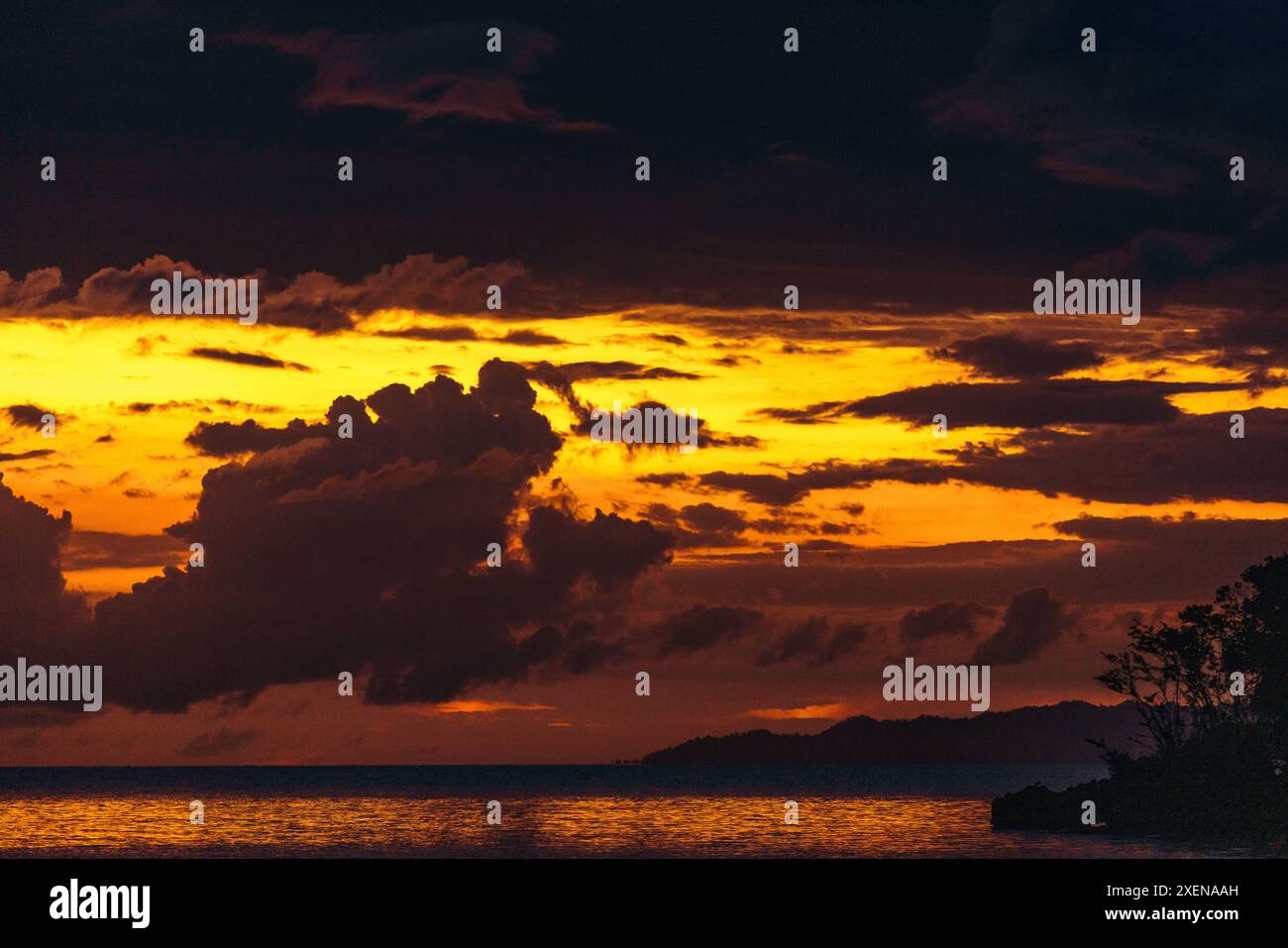 Dramatic sky at sunset over Kepulauan Togean National Park; Wakai ...