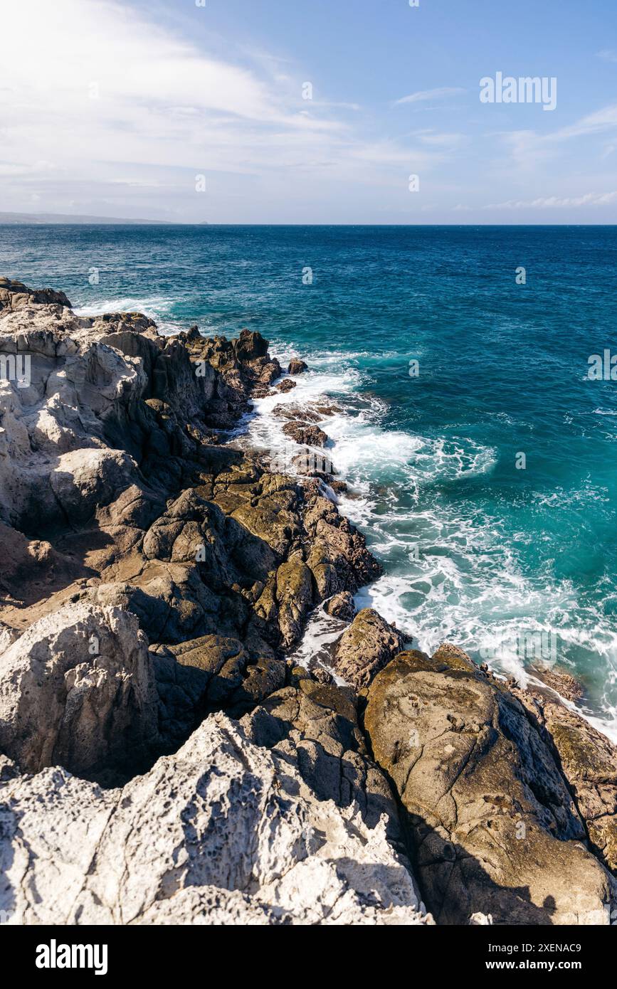 Rugged coastline at Patokan Beach (Jiko) with a view out to the ocean ...
