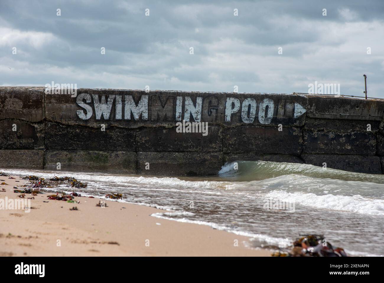 On the side of the Margate Lido the graffiti says 'swimming pool' but ...