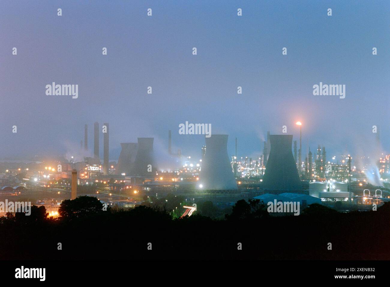 Grangemouth refinery petrochemical complex cooling towers seen at dusk ...
