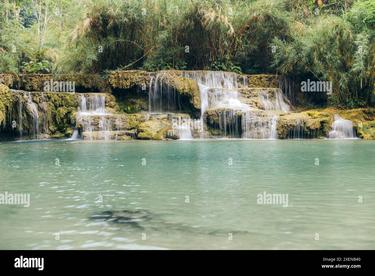 Beautiful waterfalls and lush vegetation at Kuang Si Waterfall in Laos ...