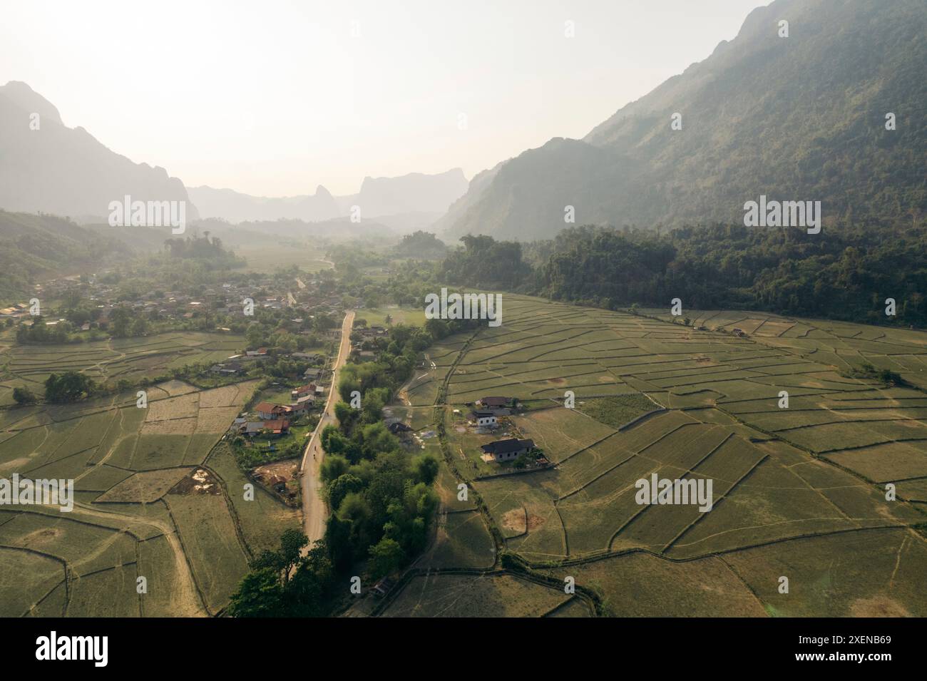Countryside with farmland and karst formations in the Vang Vieng area ...