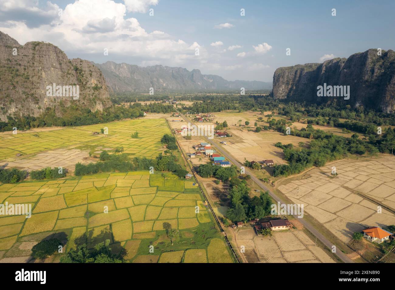 Limestone karst and rice fields in a valley near Kong Lor Cave in Laos ...