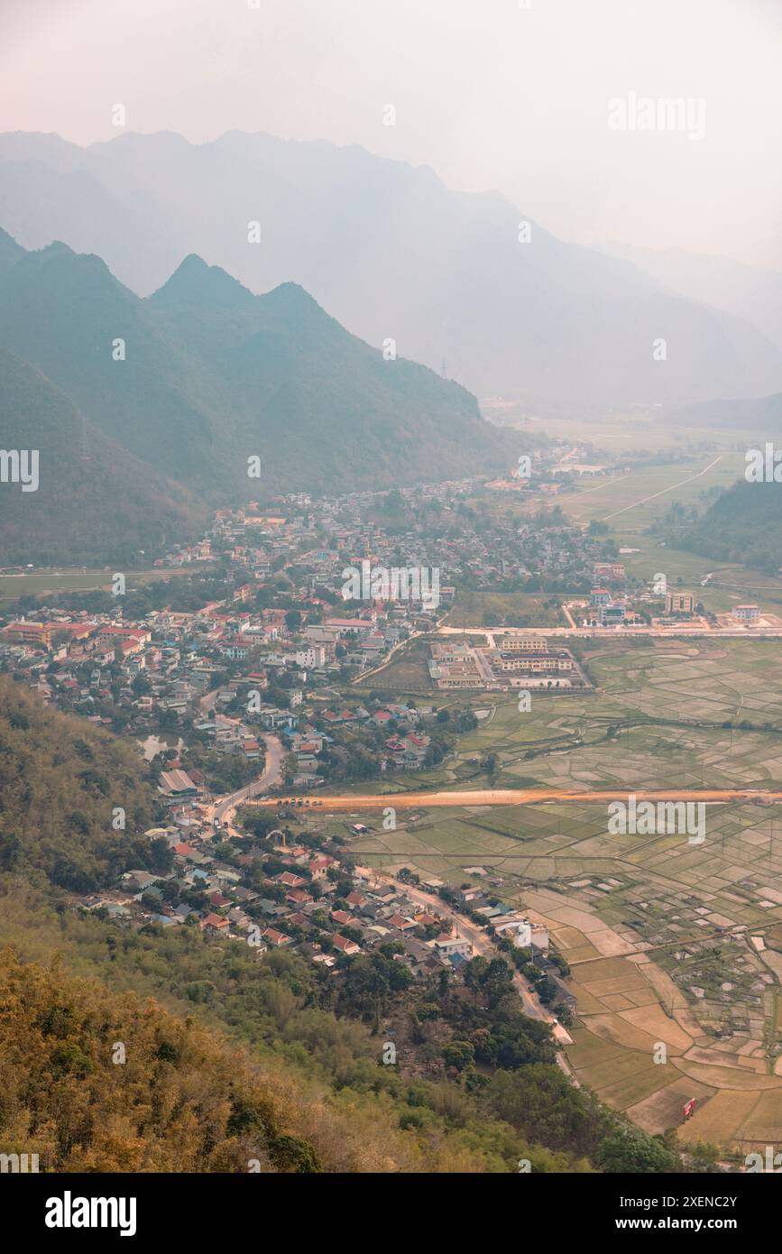 View of the town of Mai Chau in a valley on a foggy day, Vietnam; Mai ...