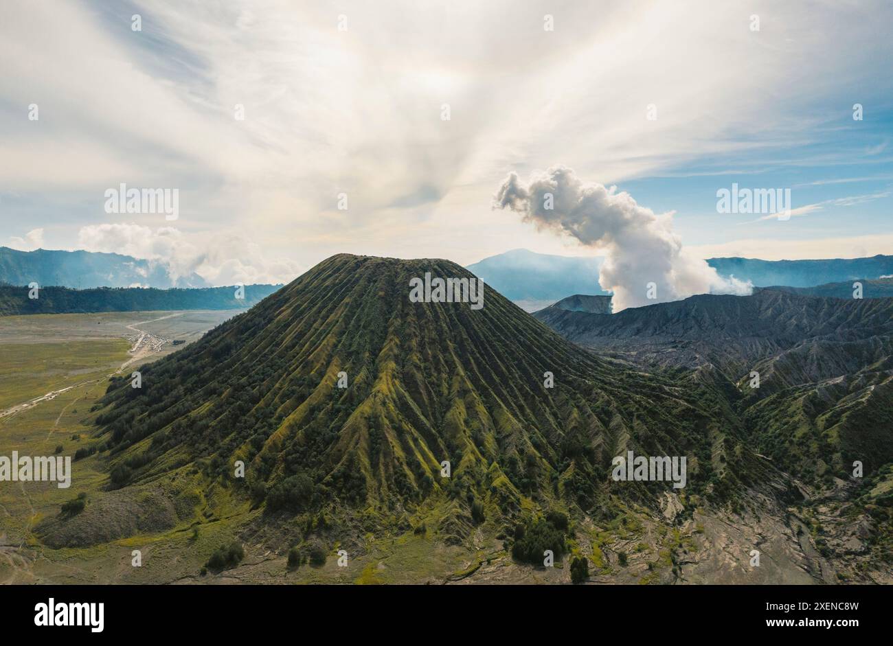 Mount Batok and steam from the crater of Mount Bromo in Bromo Tengger ...