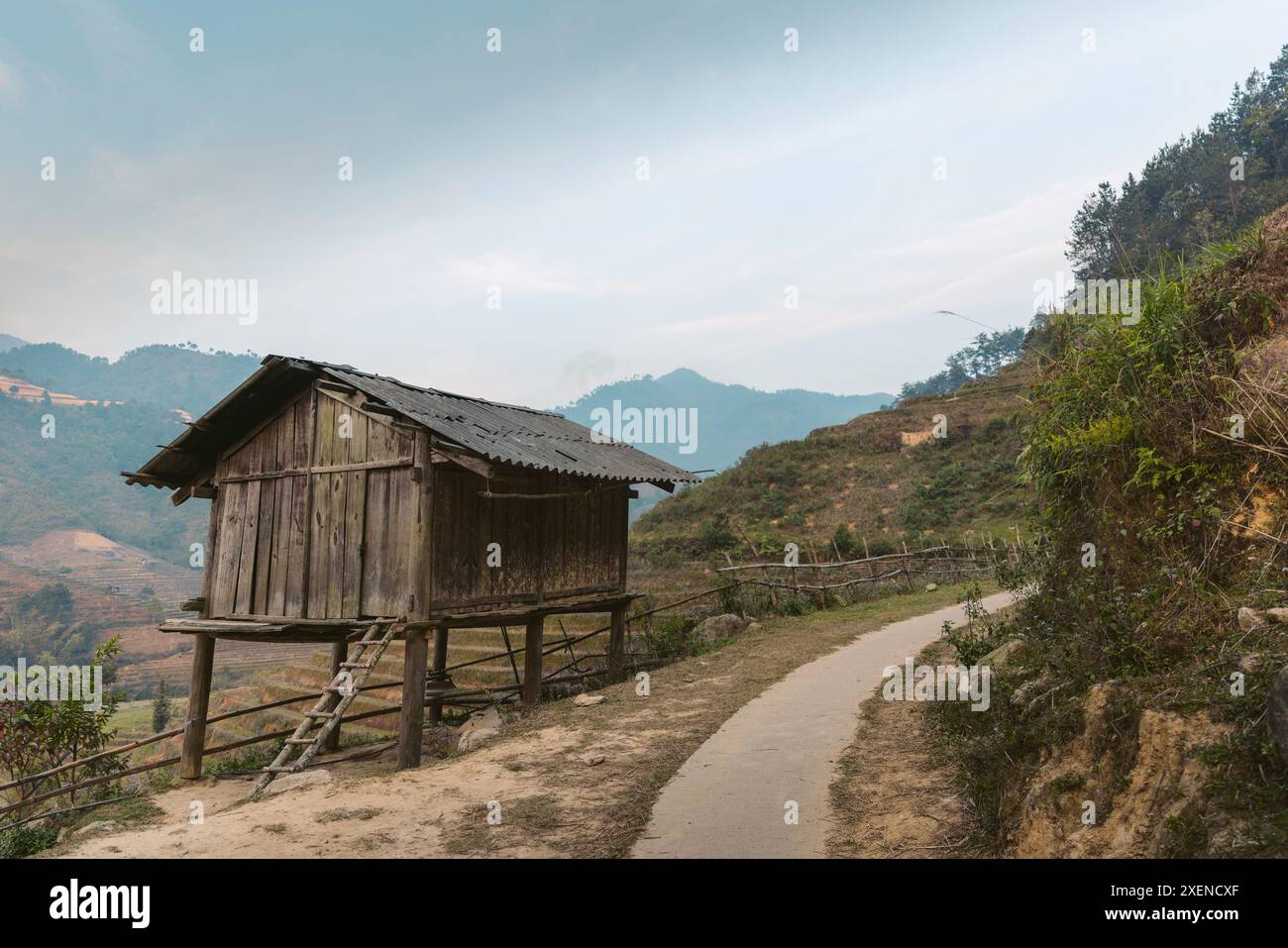 Elevated farm structure along a walking trail in the countryside of Yen ...