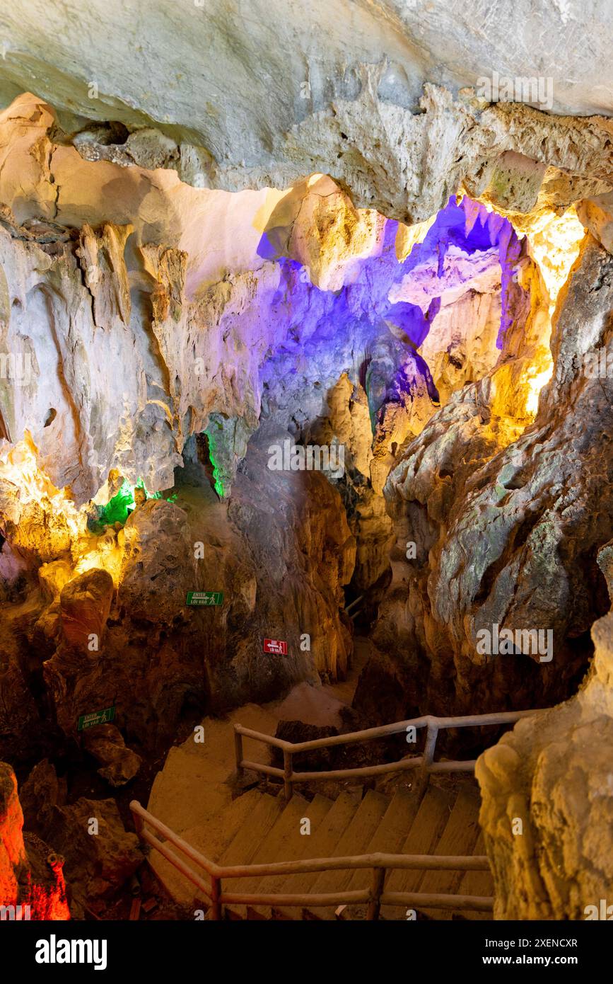 Coloured lights illuminating the interior of Tham Luong Cave in Ha ...