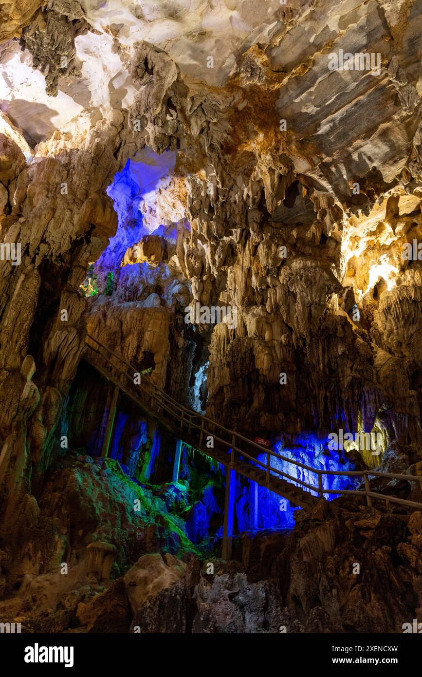 Coloured lights illuminating the interior of Tham Luong Cave in Ha ...