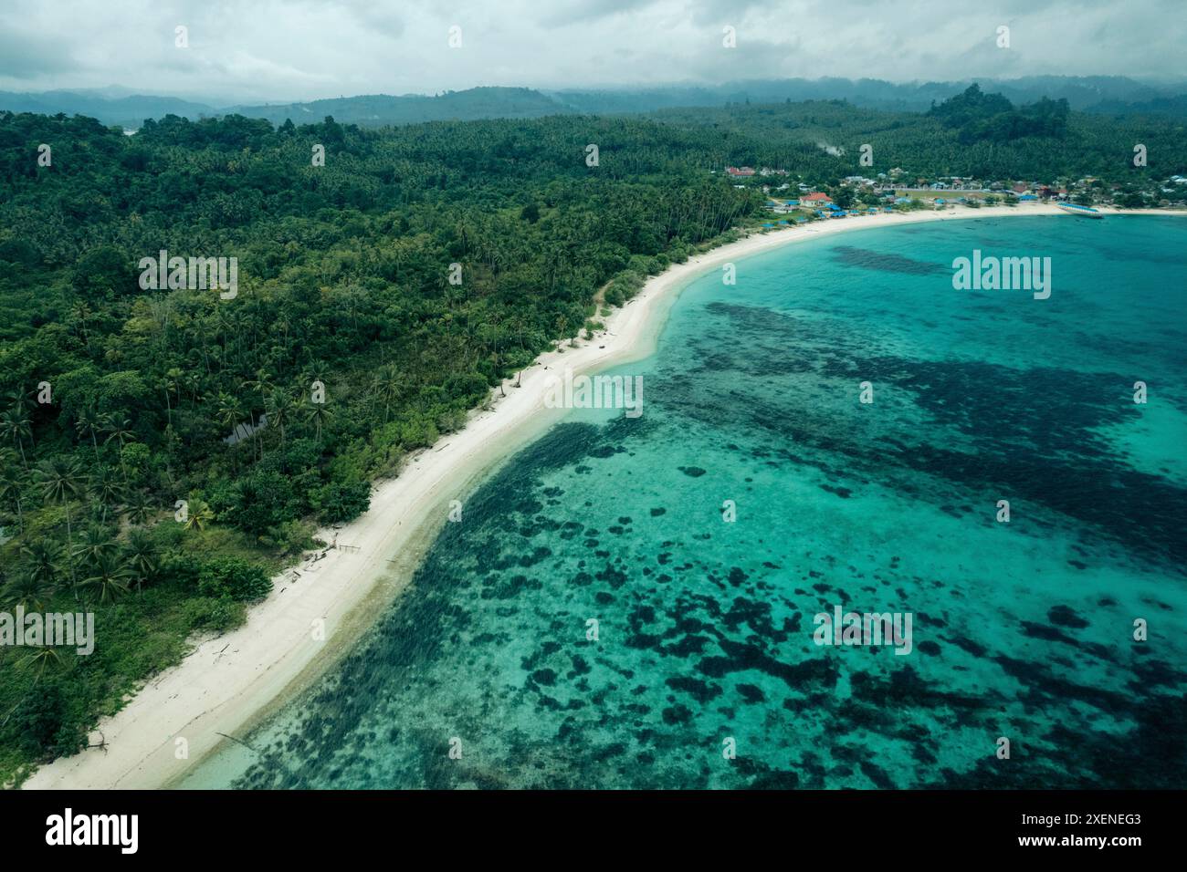 Stunning white sand beach and turquoise ocean water along a coastline ...