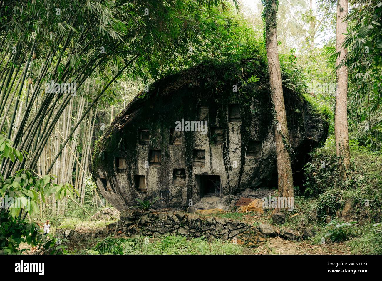 Weathered ancient stone cultural structure at Objek Wisata Kalimbuang ...