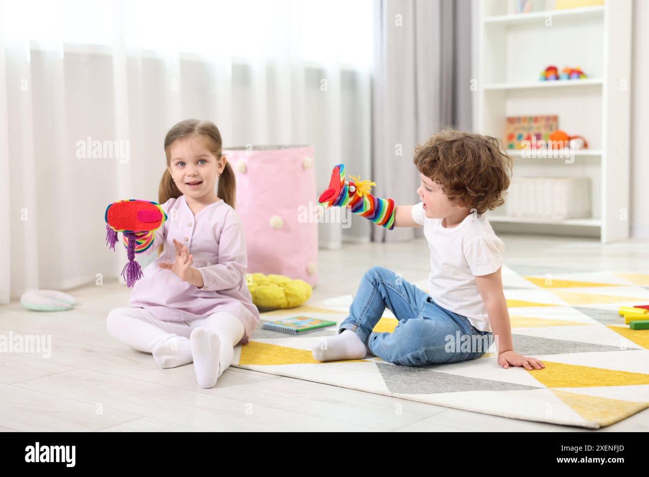 Children playing with puppets hi-res stock photography and images - Alamy