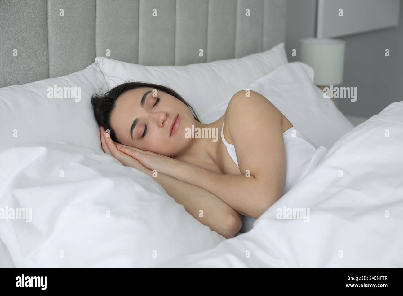 Bedtime. Beautiful woman sleeping in bed at home Stock Photo - Alamy