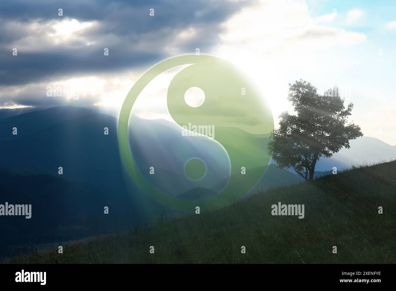Yin and yang symbol against picturesque mountain landscape Stock Photo ...